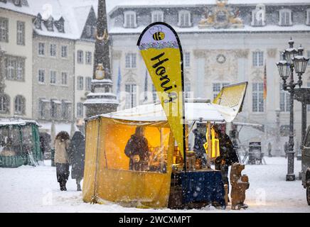 Bonn, Germany. 17th Jan, 2024. People walk through the city center in ...