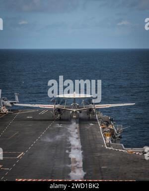 US Navy An E-2C Hawkeye launches from the flight deck aboard the ...