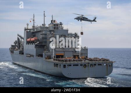 MH-60 Seahawk from USNS Comfort (T-AH 20) transports cargo from USNS ...