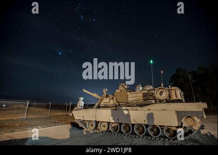 Army M1 Abrams tank gunner performs a remote-fire procedure Stock Photo ...