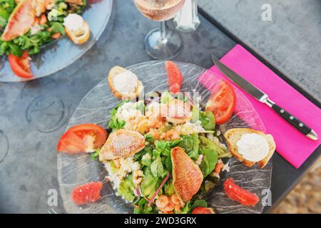 Salad provencal with red grilled snapper served in the restaurant Stock ...