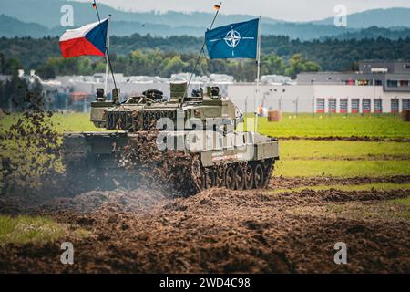 NATO tank The German made Leopard 2 A7 driving in front of Czech flag ...
