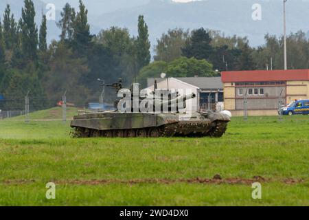 T-72 M4 CZ (Number 018) Czech army battle tank driving on grass field ...
