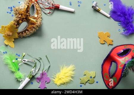 Frame made of carnival masks with party horns and decor for Mardi Gras ...