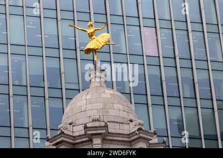 Statue of dancing ballerina Anna Pavlova on top of the Victoria Palace Theatre, Victoria, London ...