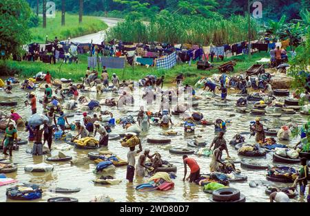 Ivory Coast, outside Abidjan people are hand washing the laundry in a ...