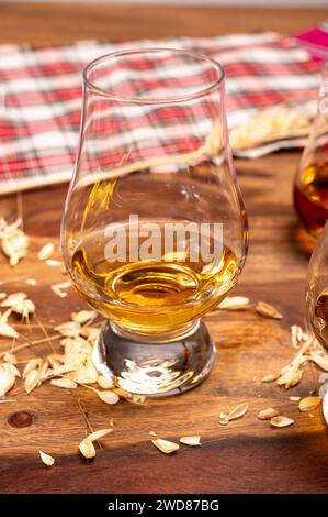 Tasting of different Scotch whiskies strong alcoholic drinks, drum ...