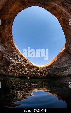 Kayaking inside Double-O arch, Lake Powell, Utah Stock Photo - Alamy