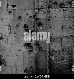 Wall with bullet holes stock photo Stock Photo - Alamy