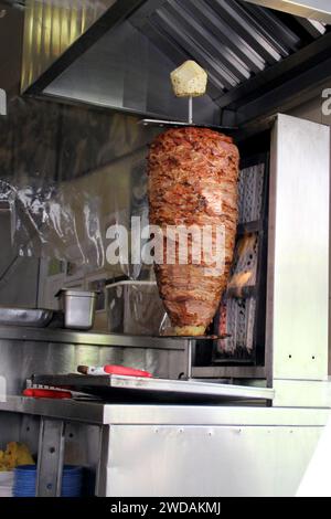 Latino taquero man working with protection mask, typical mexican food ...
