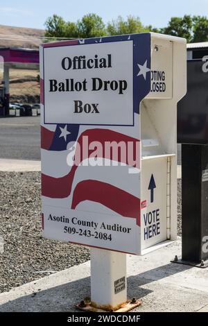Asotin, WA, USA - May 24, 2023; Name and shield on window of Asotin ...