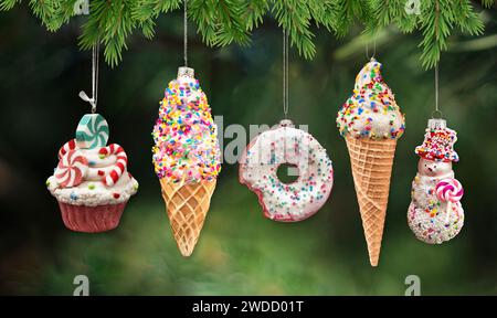 Christmas sweet cupcake bauble on dark green background Stock Photo - Alamy