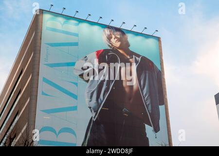 BTS V, Jan 19, 2024 : A large placard covering a building shows BTS V ...