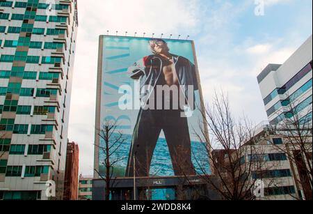 BTS V, Jan 19, 2024 : A large placard covering a building shows BTS V ...