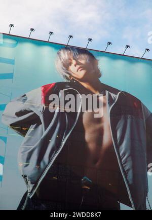 BTS V, Jan 19, 2024 : A large placard covering a building shows BTS V ...