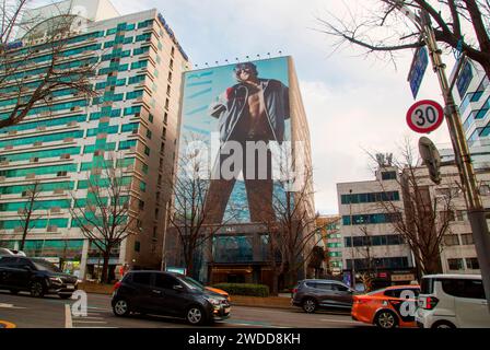 BTS V, Jan 19, 2024 : A large placard covering a building shows BTS V ...