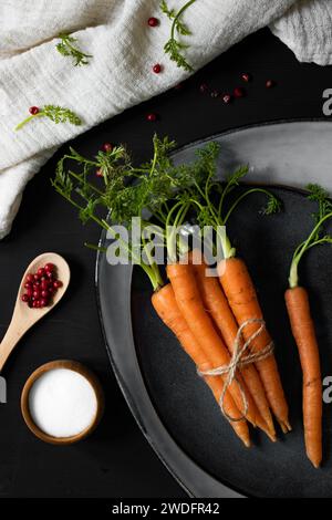 Creative carrots composition food photography Stock Photo - Alamy