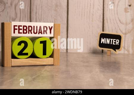 21 Februar on wooden grey cubes. Calendar cube date 21 February ...