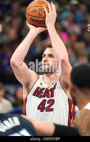 Miami Heat forward Kevin Love, center, reacts after guard Tyler Herro ...