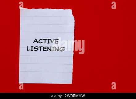Active listening lettering on ripped paper. Top view, copy space Stock ...
