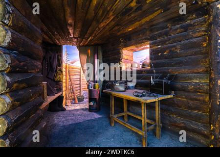 A diorama of a dug out, log cabin bunker, used for army, military ...
