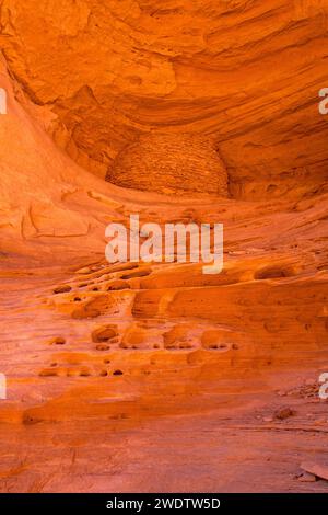 Tafoni or rock lace erosion inside Honeymoon Arch in Mystery Valley in ...