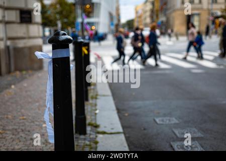 ribbon hanging on a street pole Stock Photo - Alamy