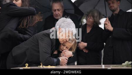 Funeral, crying family and people hug for grief support, mourning ...