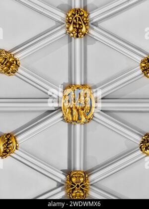 Boss on the ceiling in the nave of the medieval christian cathedral at ...