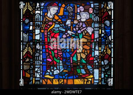 Medieval stained glass window, of a penitencer with whip, in the ...