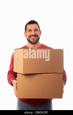 Handsome delivery man with boxes on white background Stock Photo - Alamy