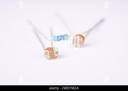 Electronic parts photoresistor and resistor on white background Stock ...
