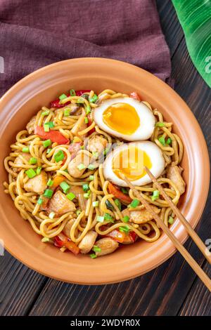 Bowl of Chicken Ramen Noodles garnished with spring onion Stock Photo ...