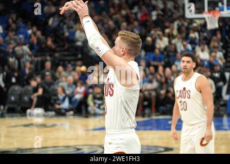 Cleveland Cavaliers' Sam Merrill (5) shoots over Milwaukee Bucks' AJ ...