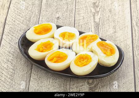 Boiled chicken egg for breakfast without eggshell in the bowl Stock ...