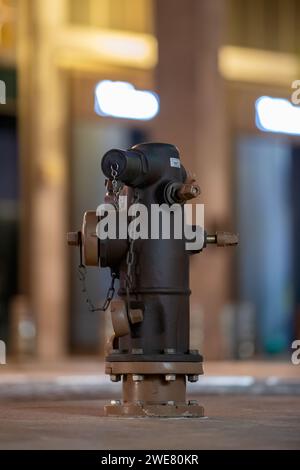 Fire hydrant on a street corner Stock Photo - Alamy