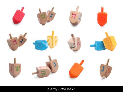 Hanukkah celebration. Different dreidels with jewish letters isolated ...
