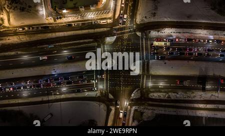 Drone photography of high intensity road in a city during cloudy winter ...