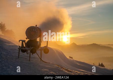 snow cannon during snowmaking on the slope Stock Photo - Alamy