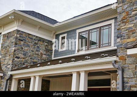 Low angle view of modern residential building under construction with ...