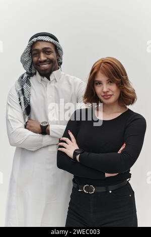 Muslim entrepreneur and a contemporary red-haired girl strike a pose ...
