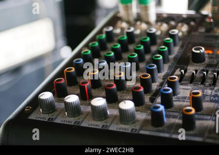 Dirty sound mixer. Backstage controls on an audio mixer. Audio music ...