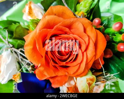 Colorful bouquet of flowers with St. John's wort, roses and eryngo ...
