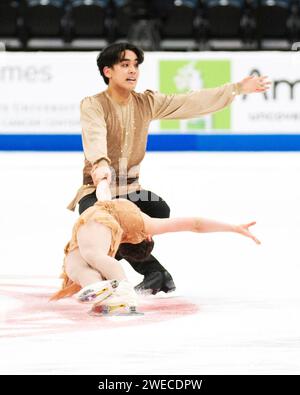 Olivia Flores and Luke Wang compete during the pairs free skating ...