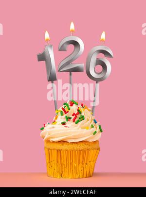 Birthday card with candle number 126 - Green background Stock Photo - Alamy