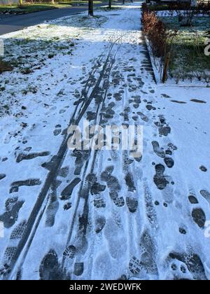 Aerial view of footsteps in the snow Stock Photo - Alamy