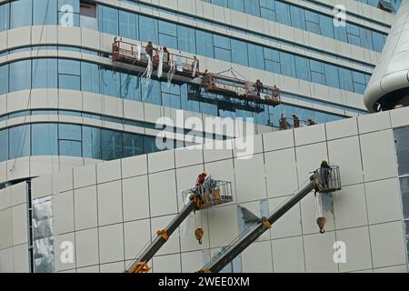 Construction workers in mobile hydraulic construction platform Stock ...