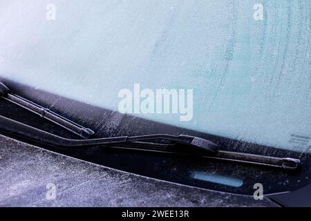 Frosty, icy, car windscreen wiper frozen to windscreen Stock Photo - Alamy