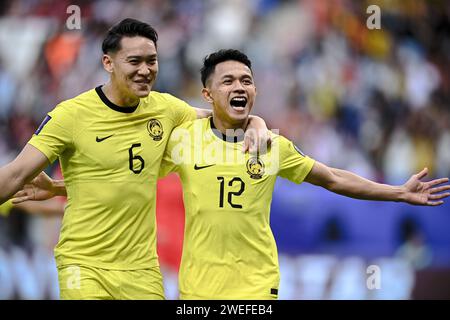 Doha. 25th Jan, 2024. Arif Aiman Hanapi of Malaysia shoots the penalty ...