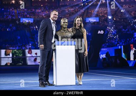 Lleyton Hewitt with his wife Bec Hewitt posing with a statue of himself ...